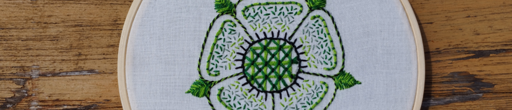 Tudor-inspired Yorkshire Rose surface embroidery with Form in Fabric